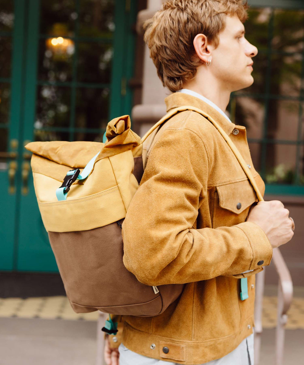Minimalistic backpacks, tote bags, travel bags, and leather goods.