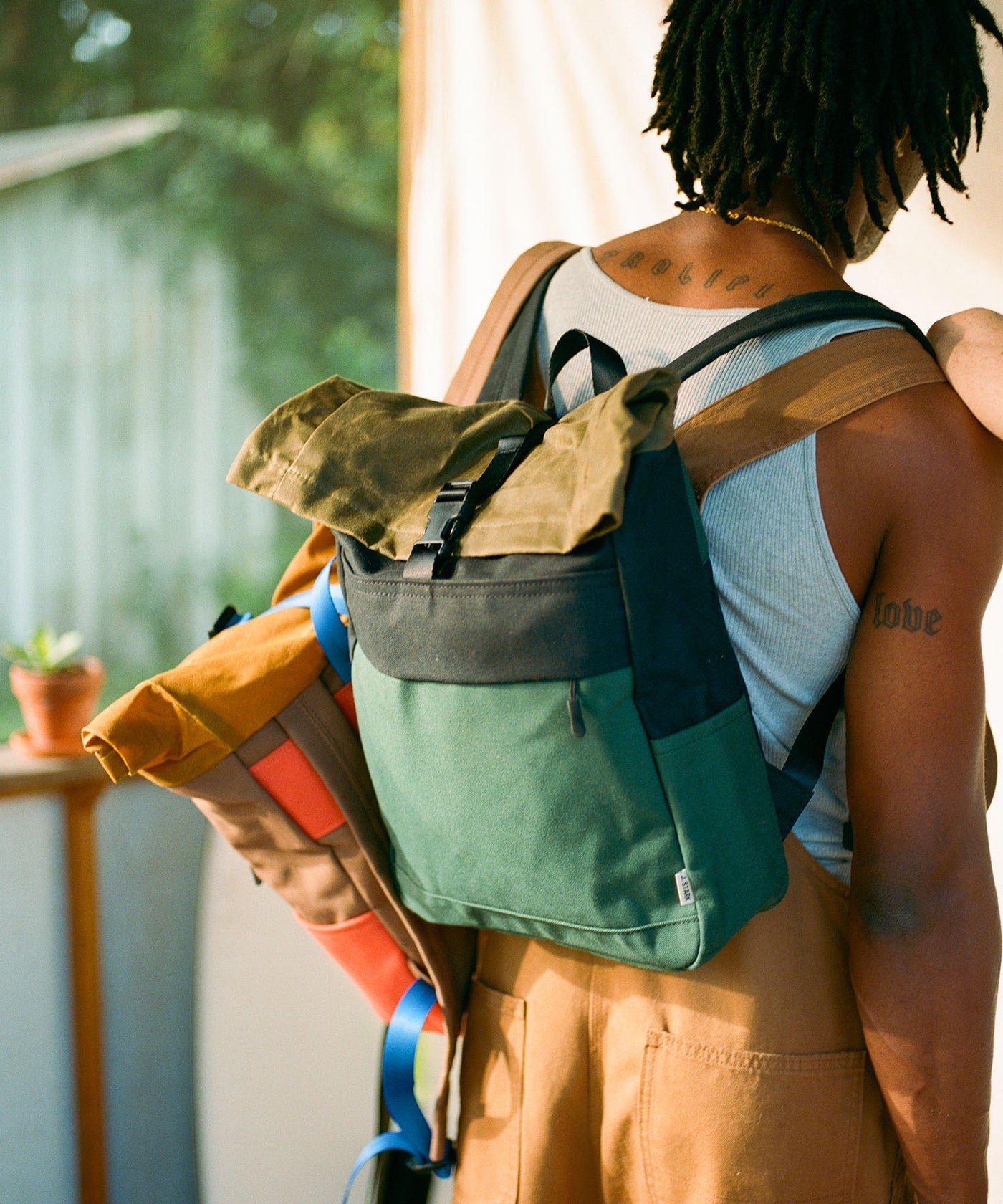 Minimalistic backpacks, tote bags, travel bags, and leather goods.